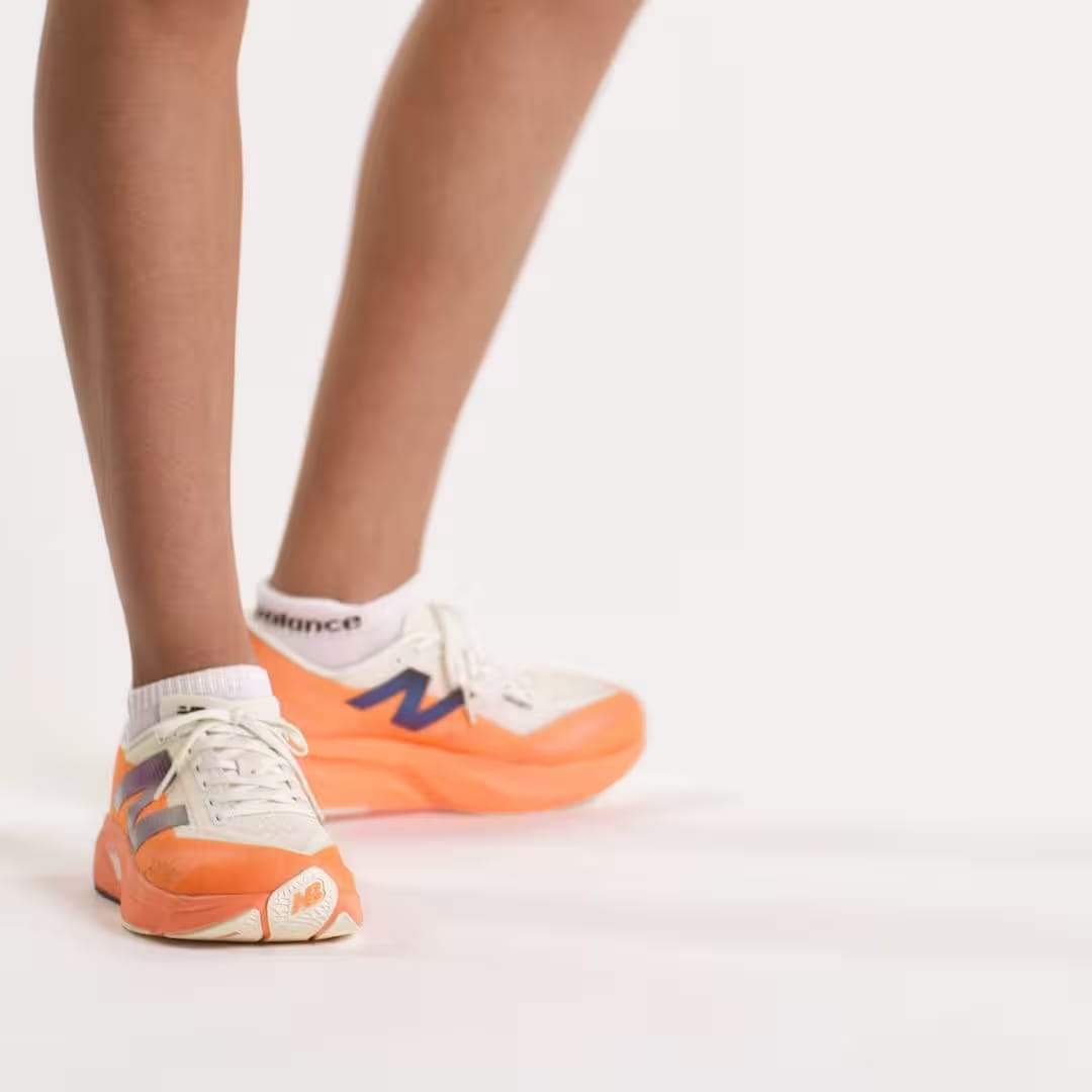 New Balance FuelCell Rebel v4 Hot Mango Angora… | Sneaker Squad